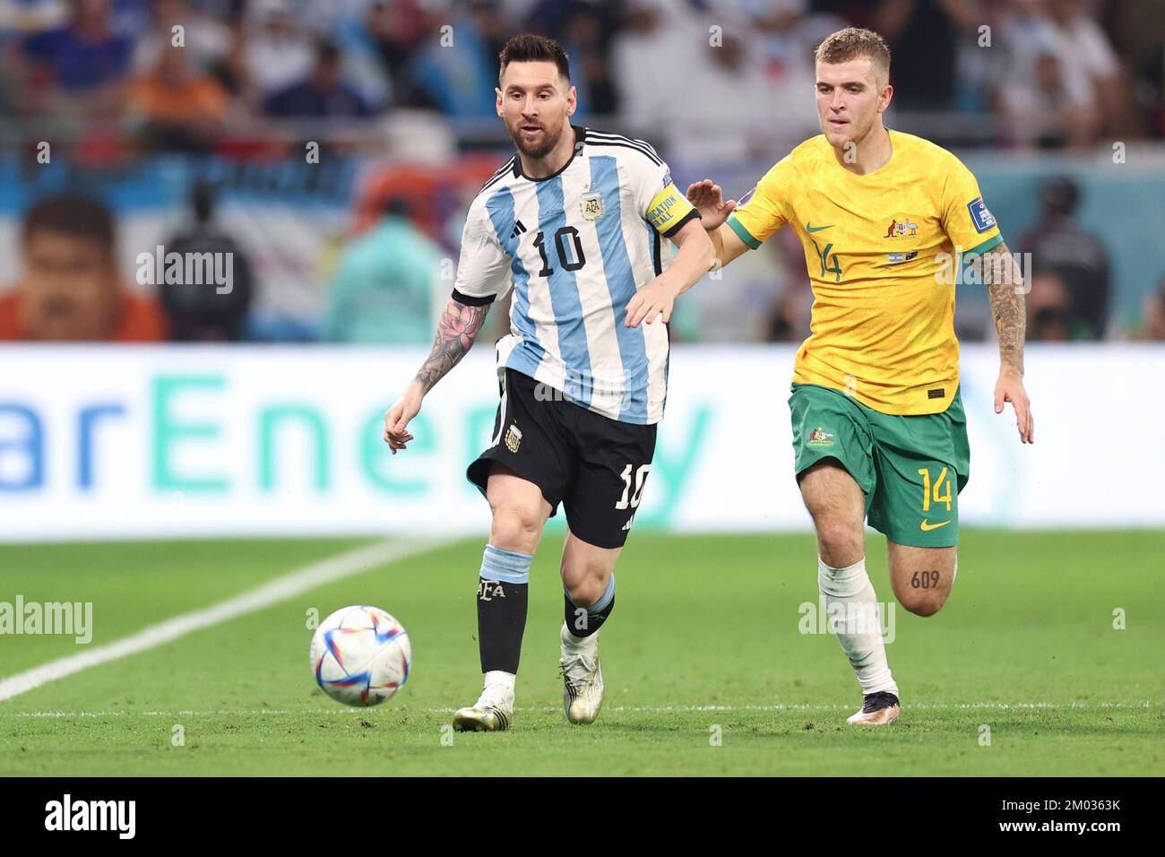 Al Rayyan, Qatar. 3rd Dec, 2022. Lionel Messi (L) of Argentina vies ...