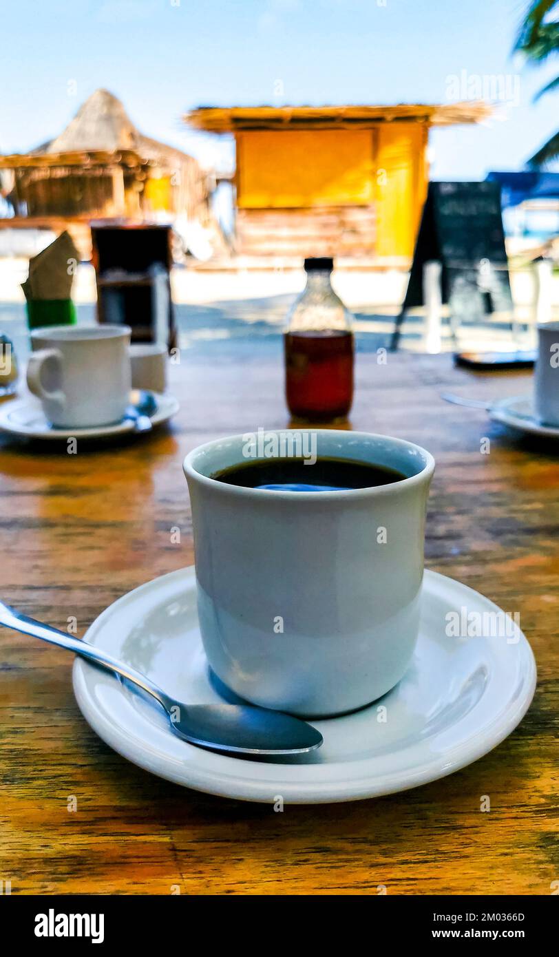 Cup of americano black coffee with spoon and plate on table food and ...
