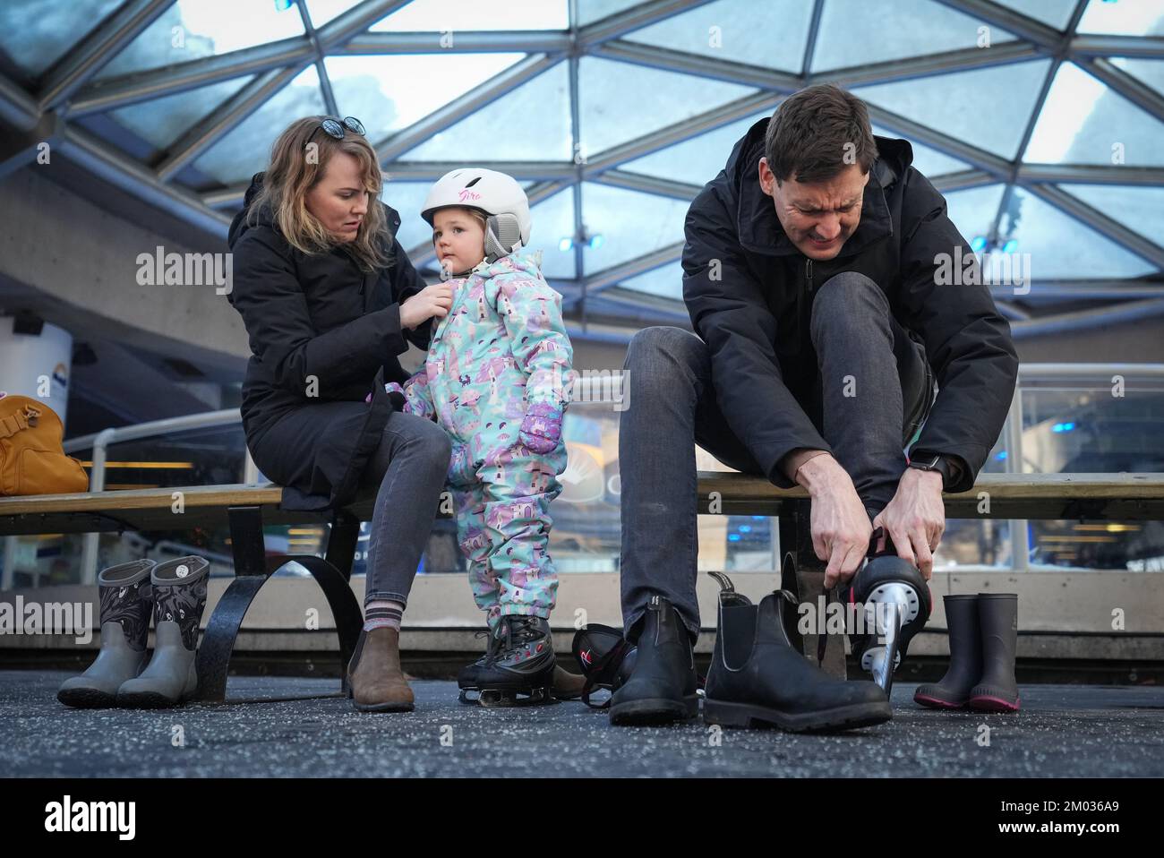 B.C. Premier David Eby puts on skates as he and his wife Cailey Lynch ...