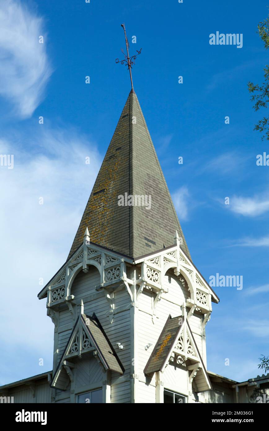 The house spire with a weathervane on a top, an example of historic ...