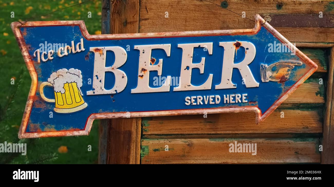Sign cold beer served here Stock Photo - Alamy