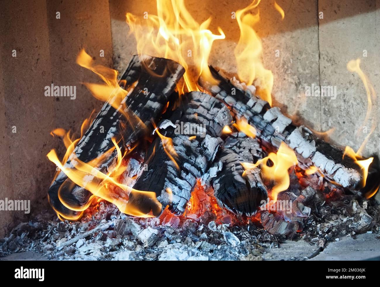 Burning camping fire with flames Stock Photo - Alamy