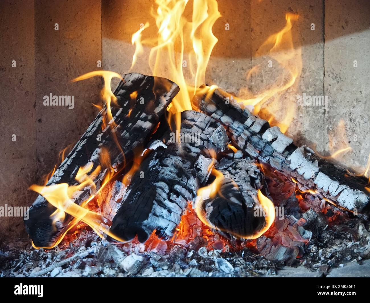 Burning camping fire with flames Stock Photo - Alamy