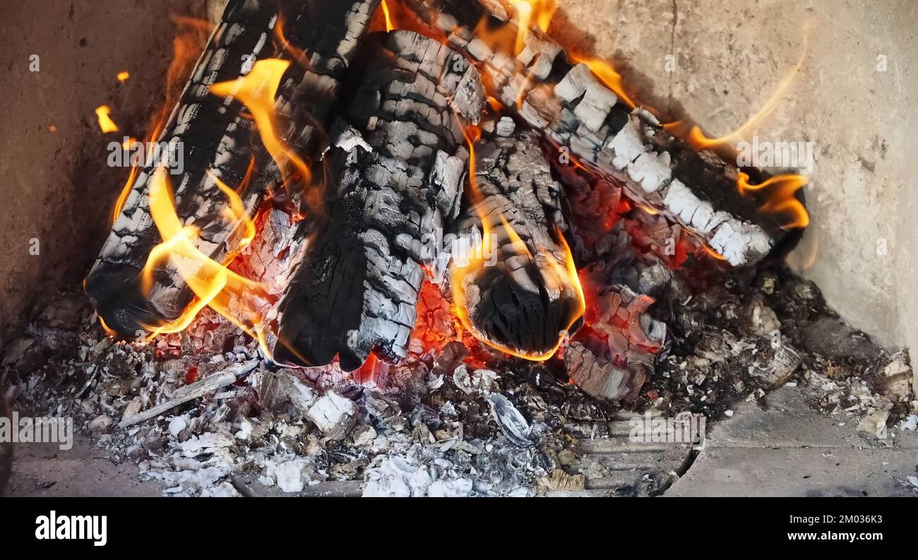Burning camping fire with flames Stock Photo - Alamy