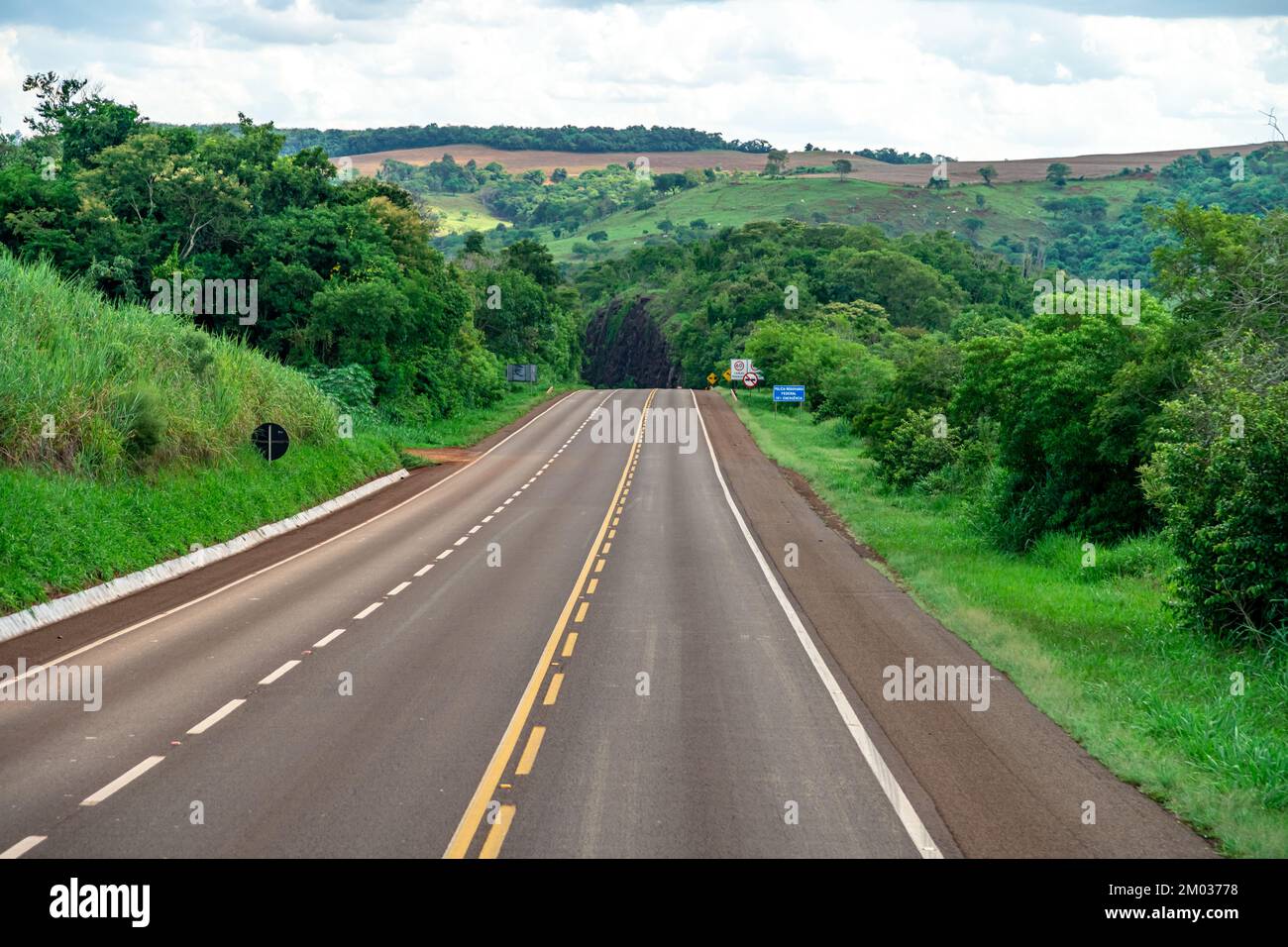 asphalt road in Brazilian nature in South America. motion blur Stock ...