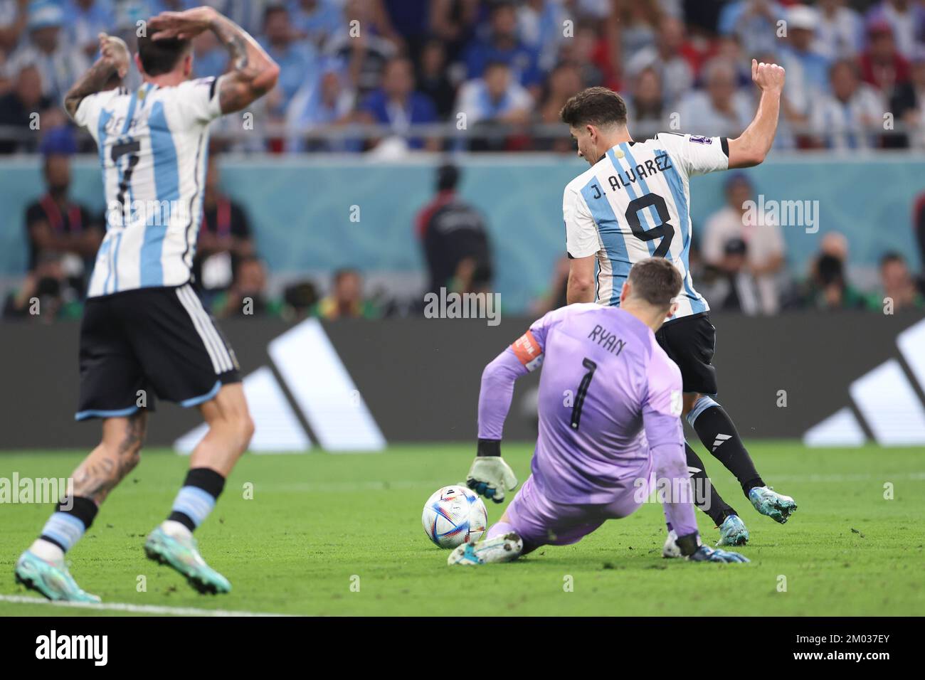 Al Rayyan, Qatar. 3rd Dec, 2022. Julian Alvarez (R) of Argentina vies ...