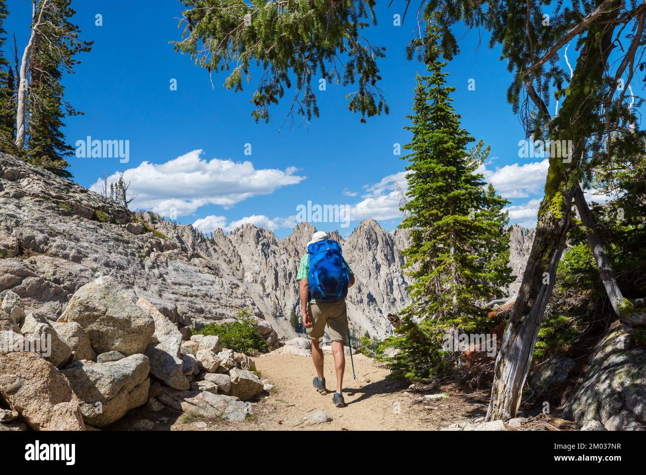 hiker in mountains on beautiful rock background Stock Photo - Alamy