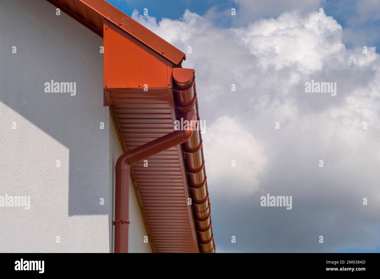 A metal roof of the house and a drain. Close-up side view Stock Photo ... A metal roof of the house and a drain. Close-up side view Stock Photo ...