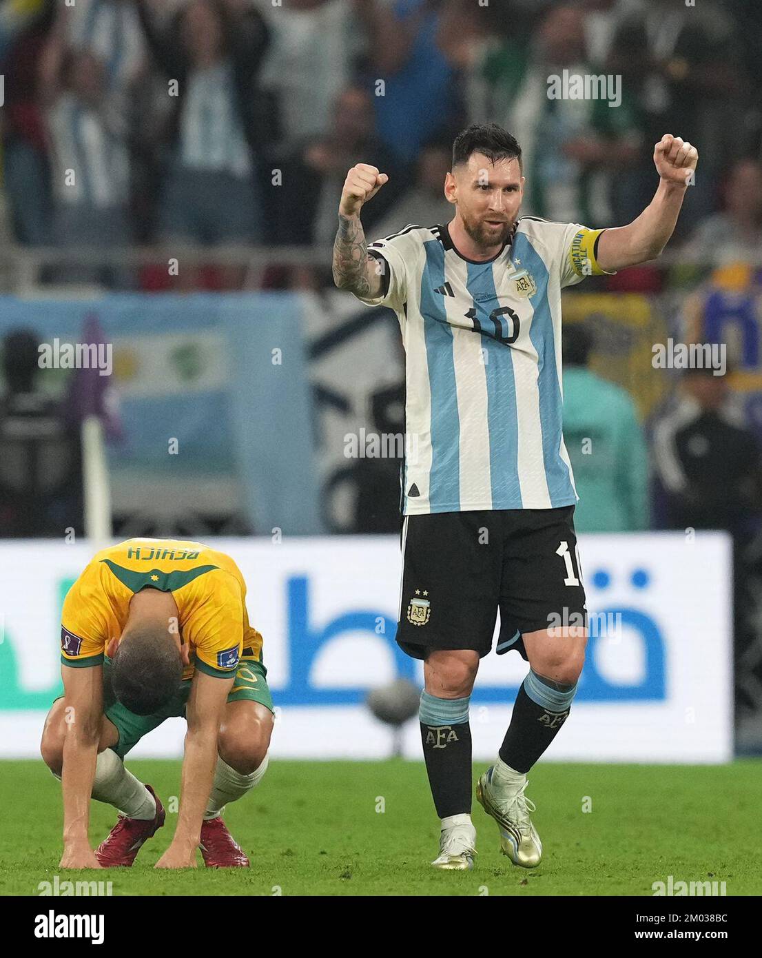 Argentina's Lionel Messi (right) celebrates as Australia's Mitchell ...
