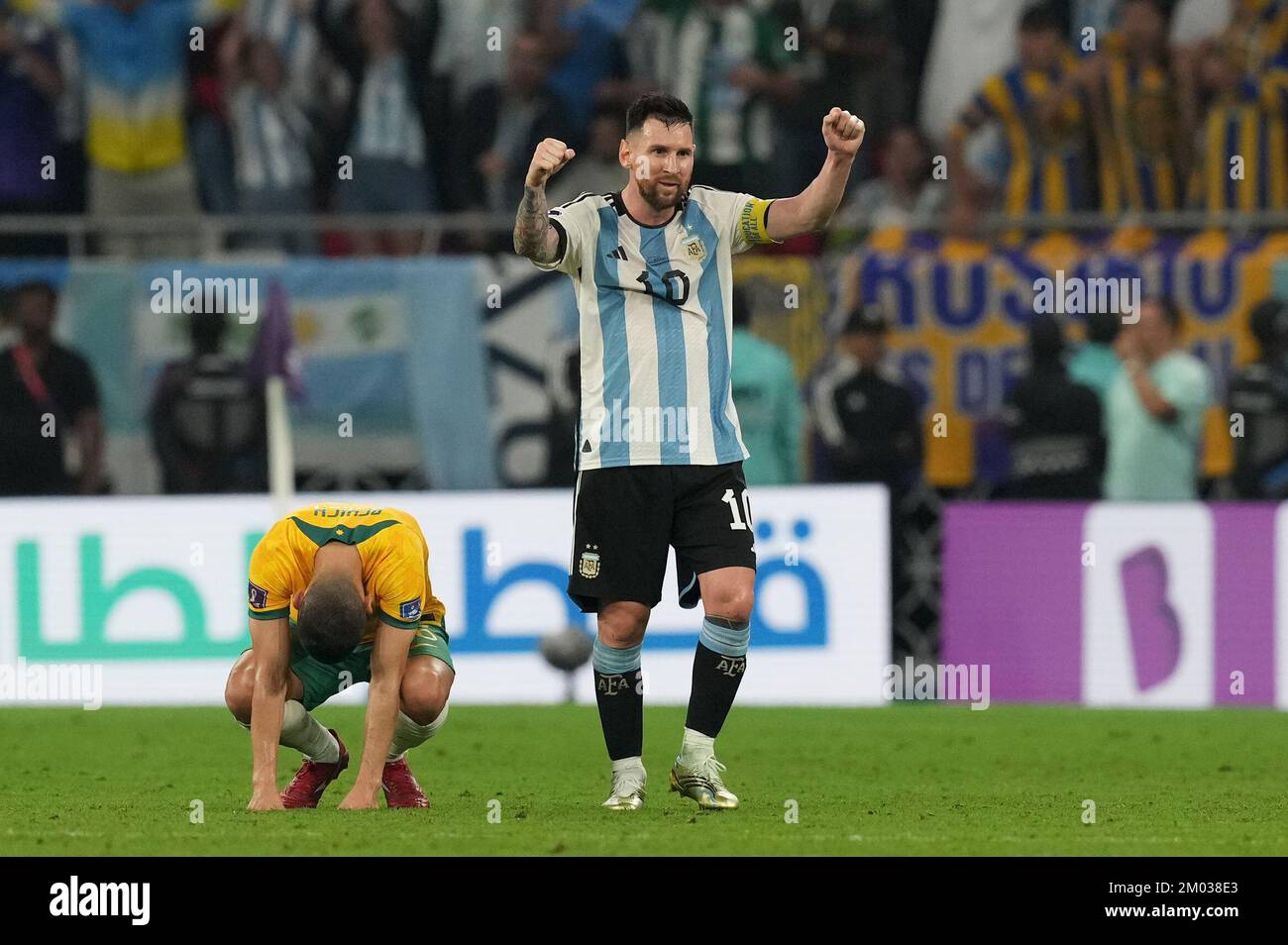 Argentina's Lionel Messi (right) celebrates as Australia's Mitchell ...