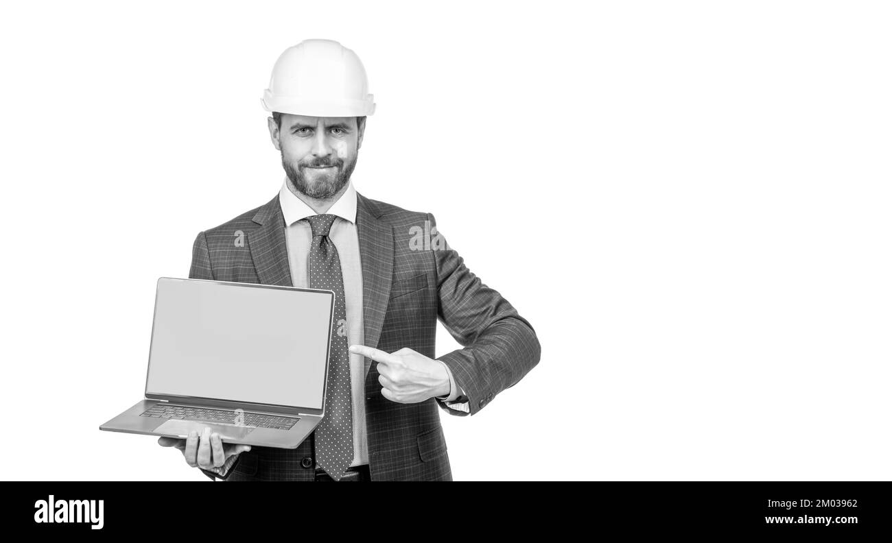 confident businessman man in suit and safety helmet pointing finger on ...