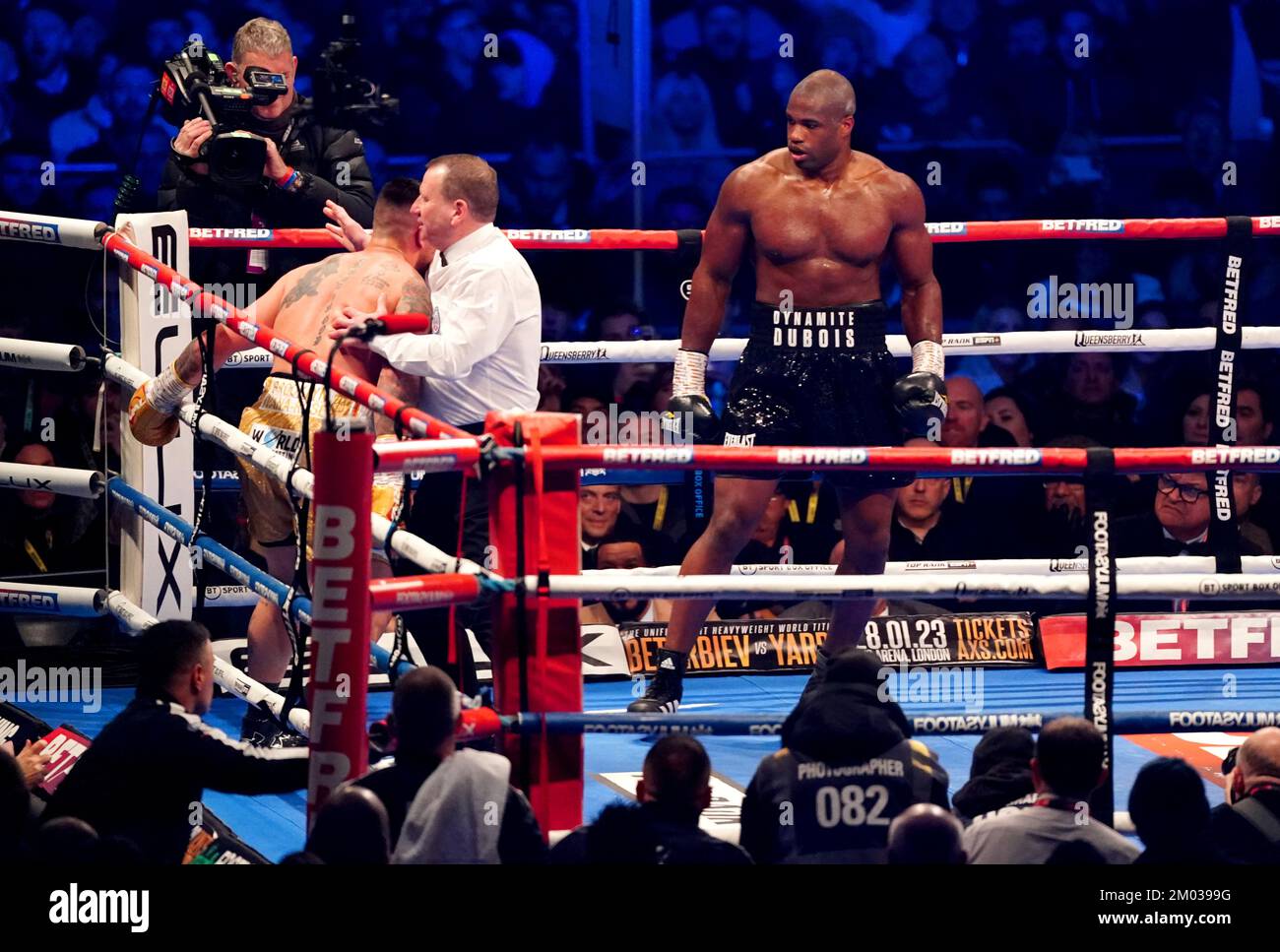 Daniel Dubois walks away as the referee holds onto Kevin Lerena before ...