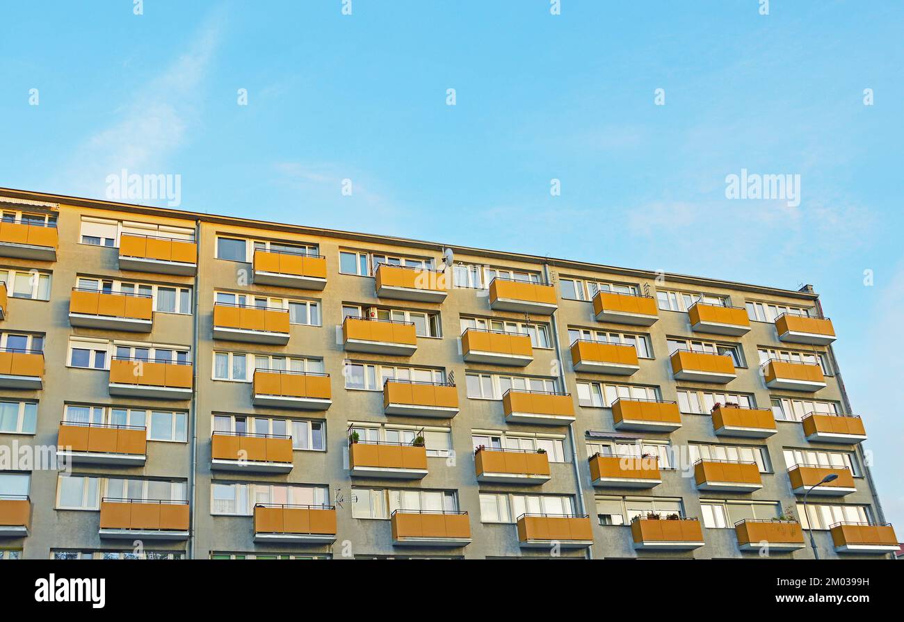 A multi-storey residential building with balconies in the Polish city ...
