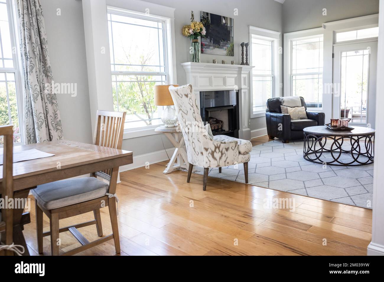 A light and bright open concept living room den with vaulted ceilings ...