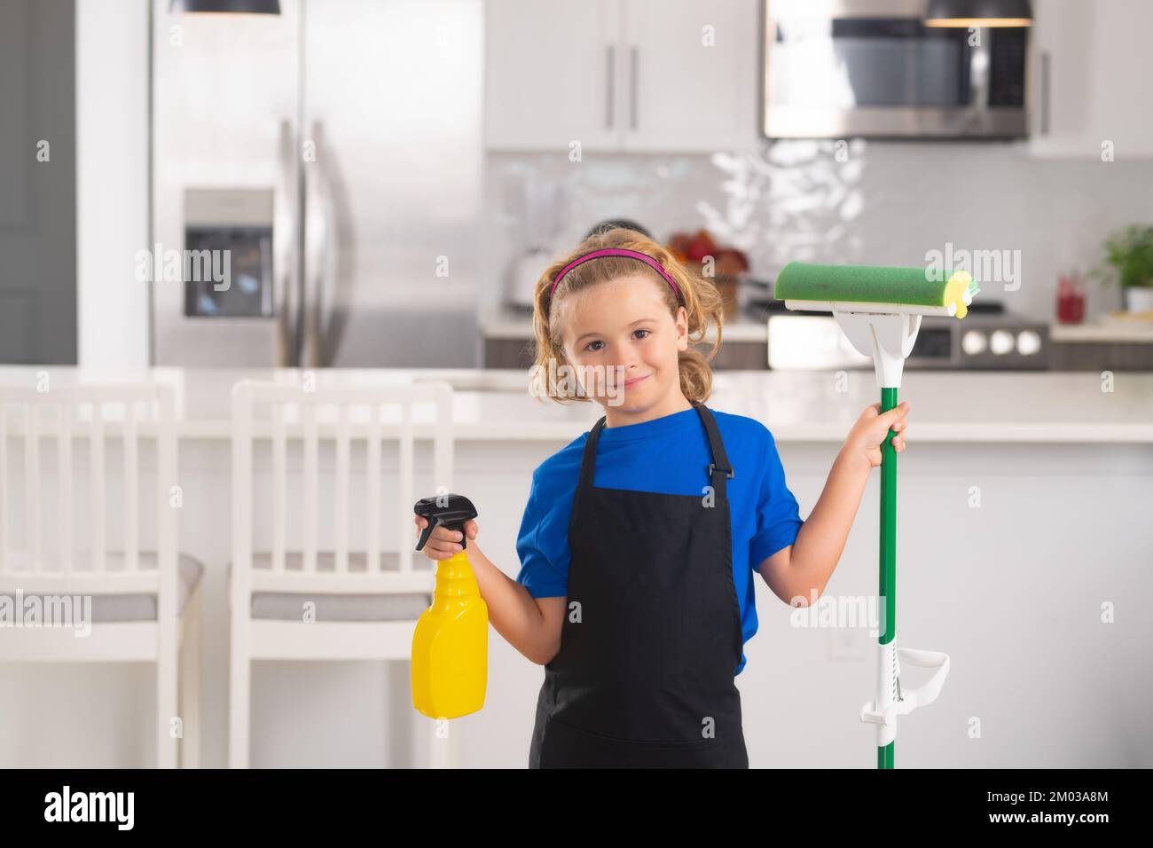 Children helping with housekeeping, cleaning the house. Housekeeping at ...