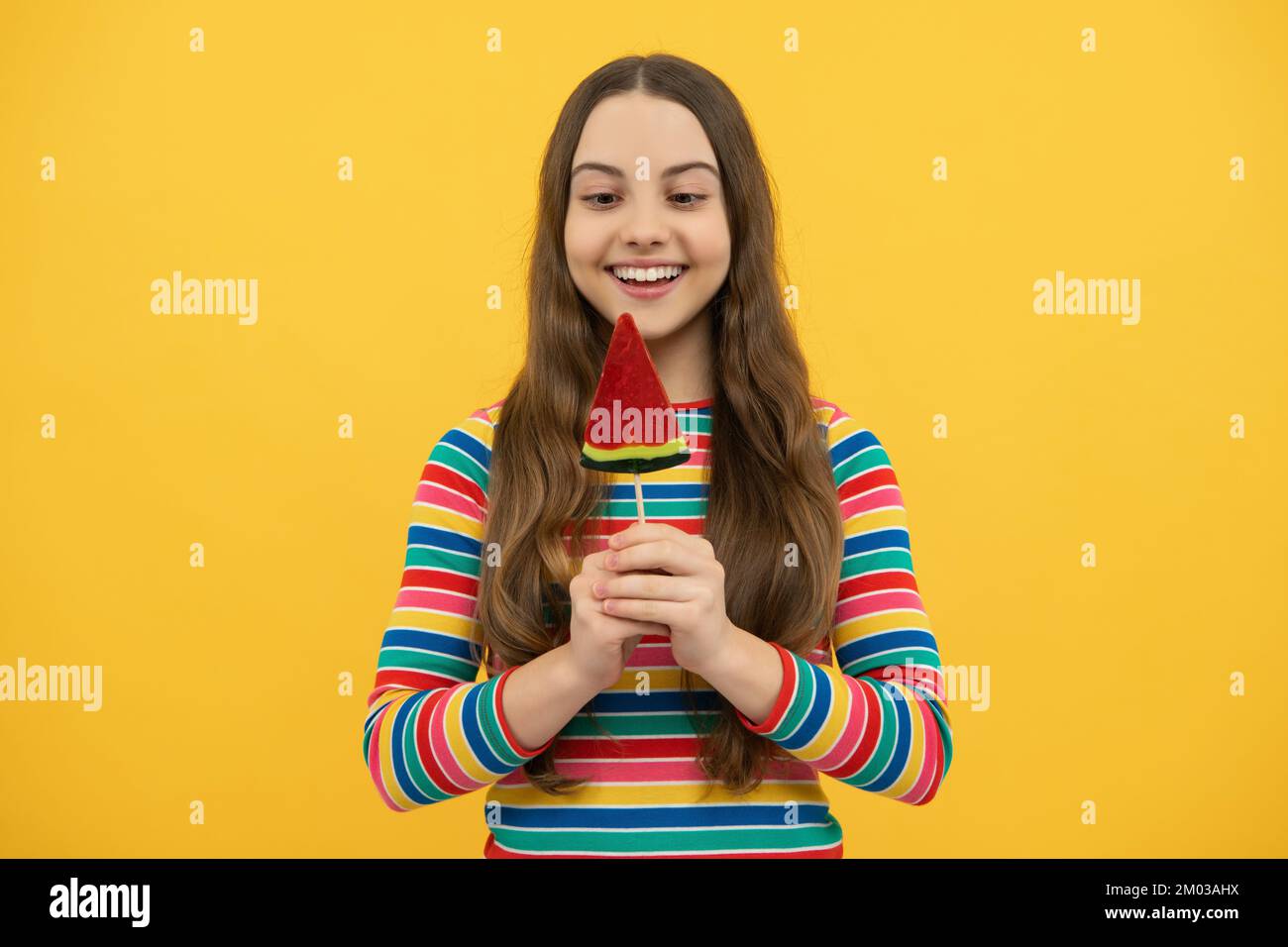 Teenage girl with candy lollipop, happy child 12, 13, 14 years old ...