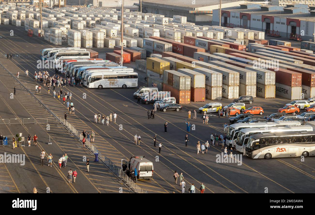 Excursion buses with tourists in the container port of Agadir (Morocco ...