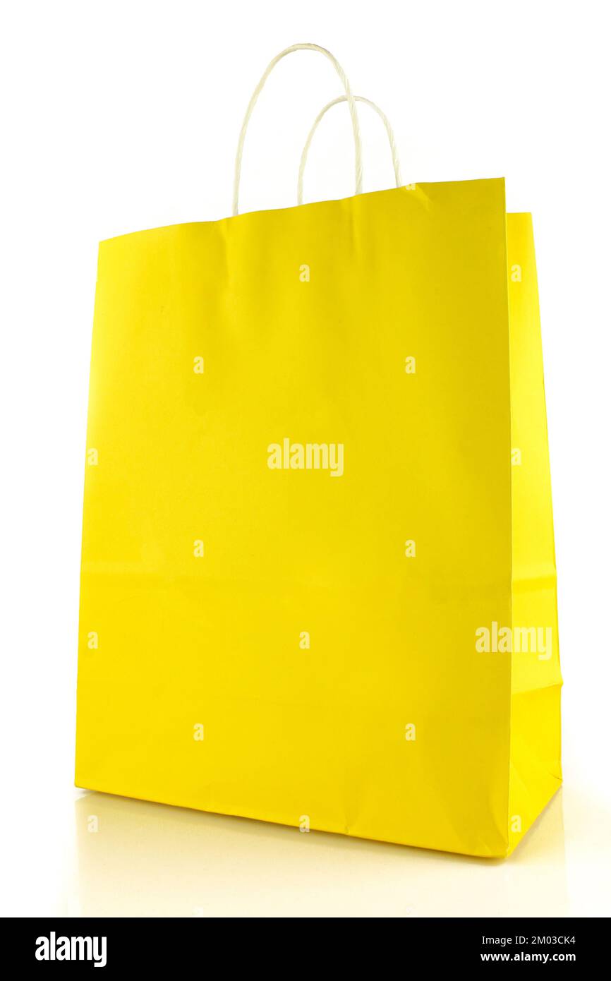 Yellow blank paper bag isolated on white background. Shopping Stock ...