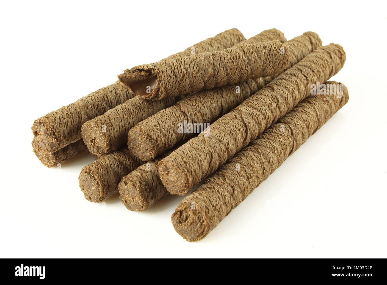 Pile of wafer roll sticks filled with chocolate isolated on white ...