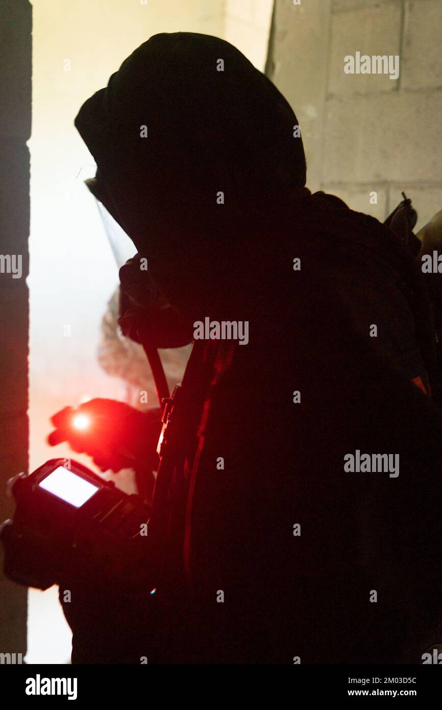 U.S. Marine Corps Lance Cpl. Cesar Arroyo a chemical, biological ...