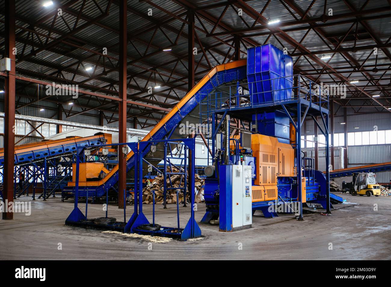 Modern waste processing plant. Sorting, pressing and packing of garbage ...