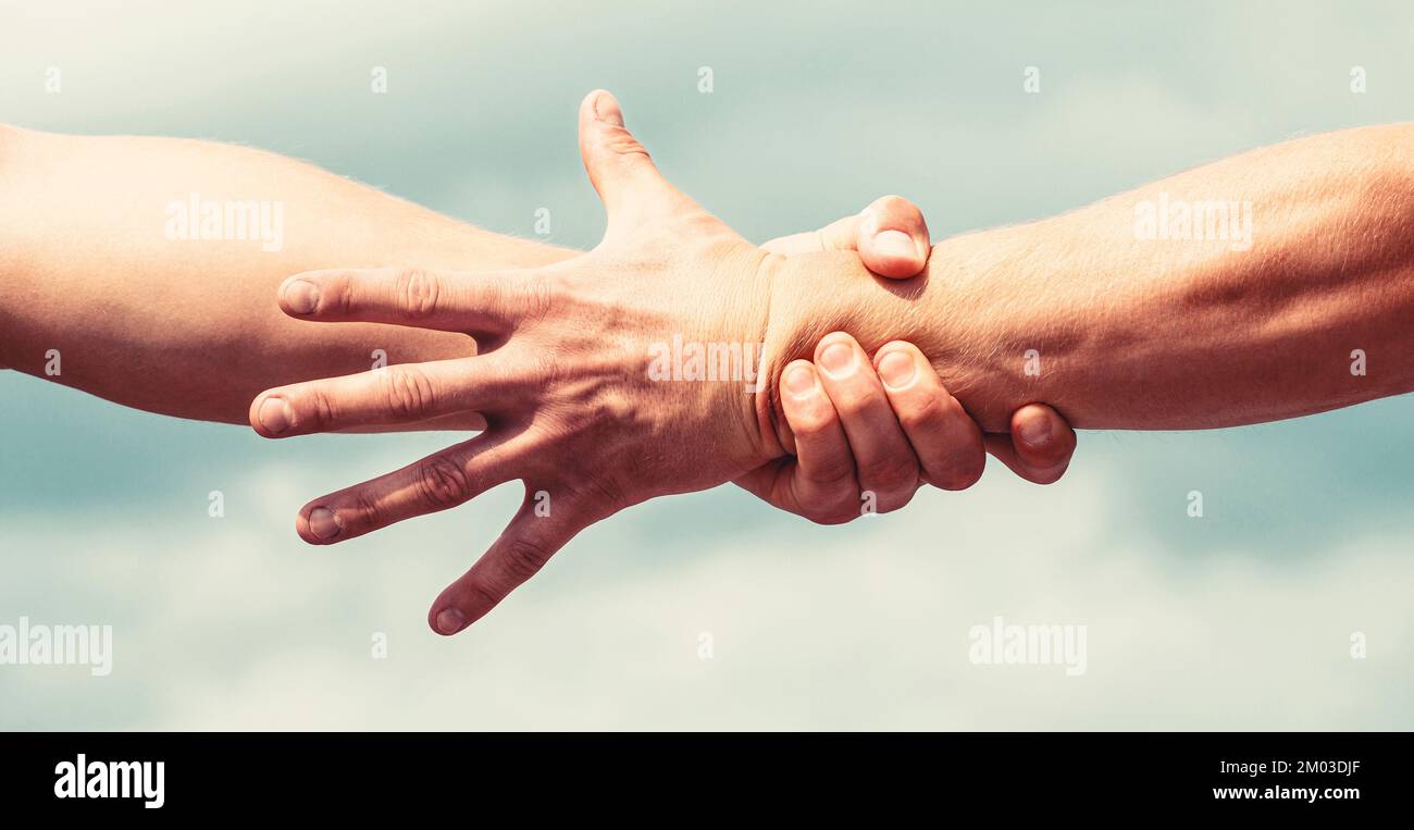 Friendly handshake. Two hands, shaking hands. Rescue, helping gesture ...