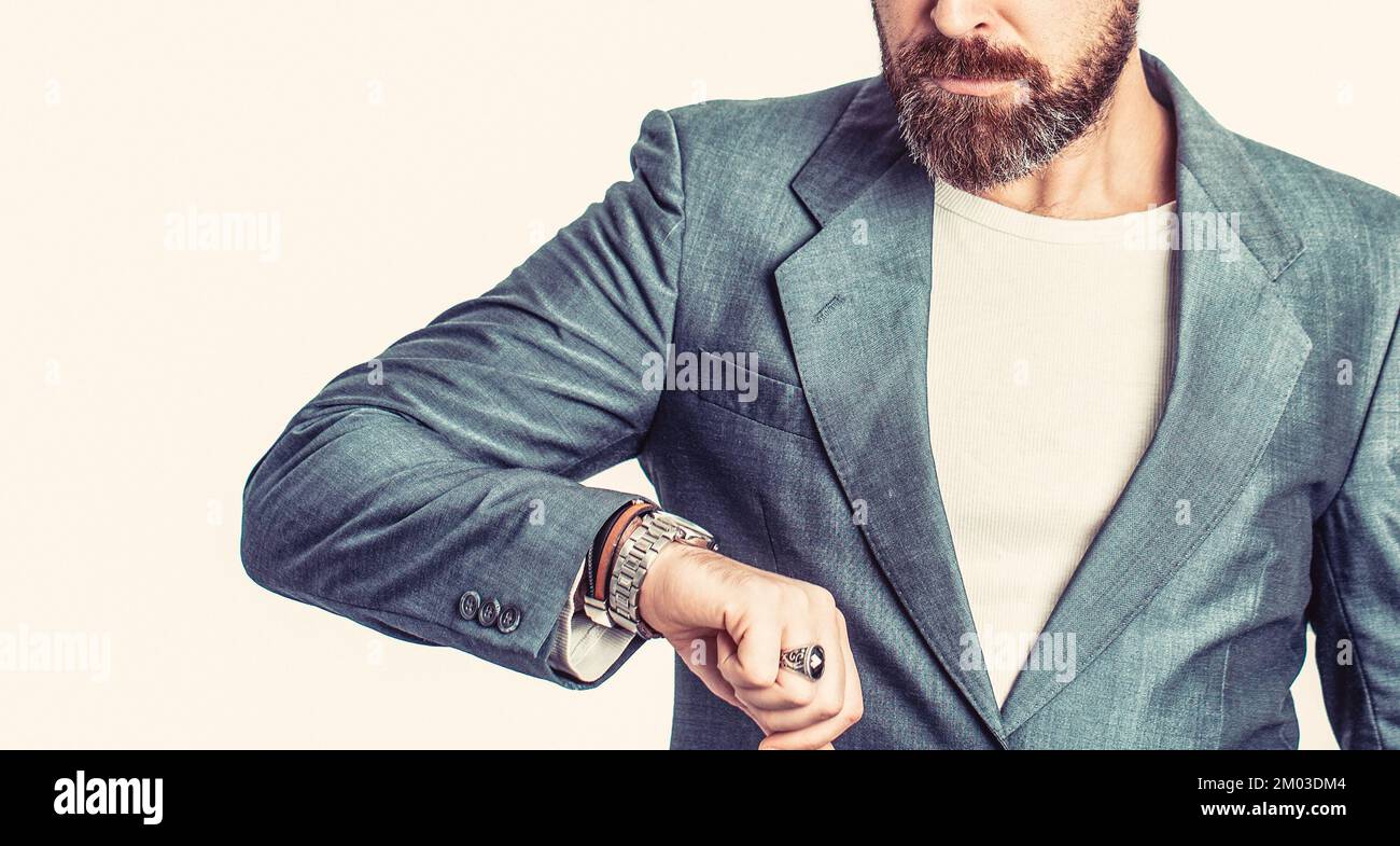 Business man showing time on his wrist watch. Hand in with wrist watch ...