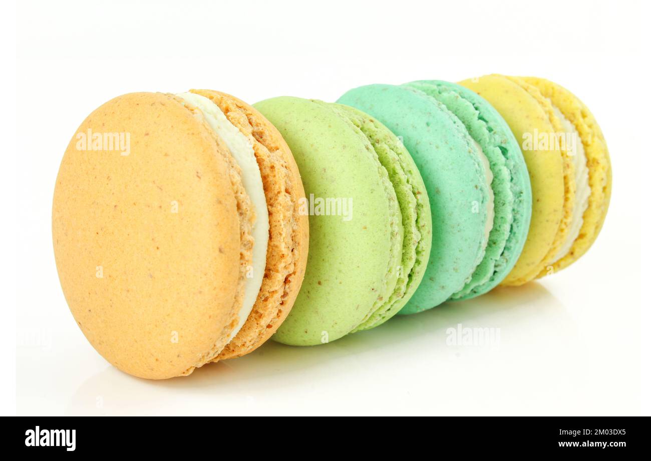 Group of colorful macarons isolated on white background. French ...