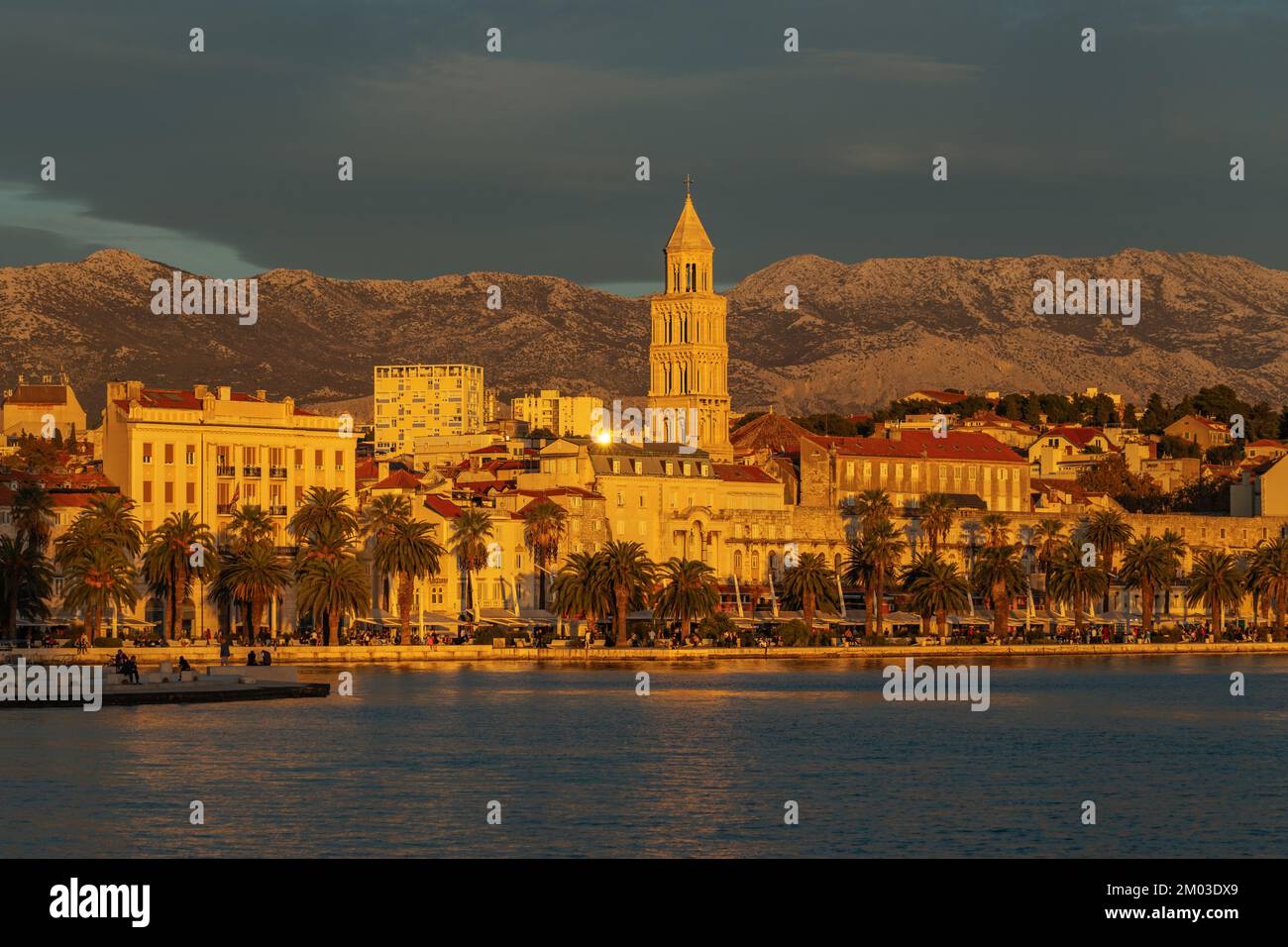 The magic sunset in Split, Croatia. The view on Split's town embankment ...