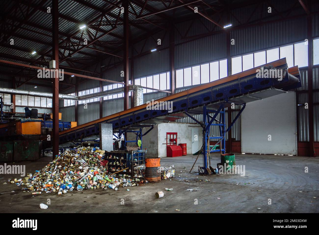Modern waste processing plant. Sorting, pressing and packing of garbage ...