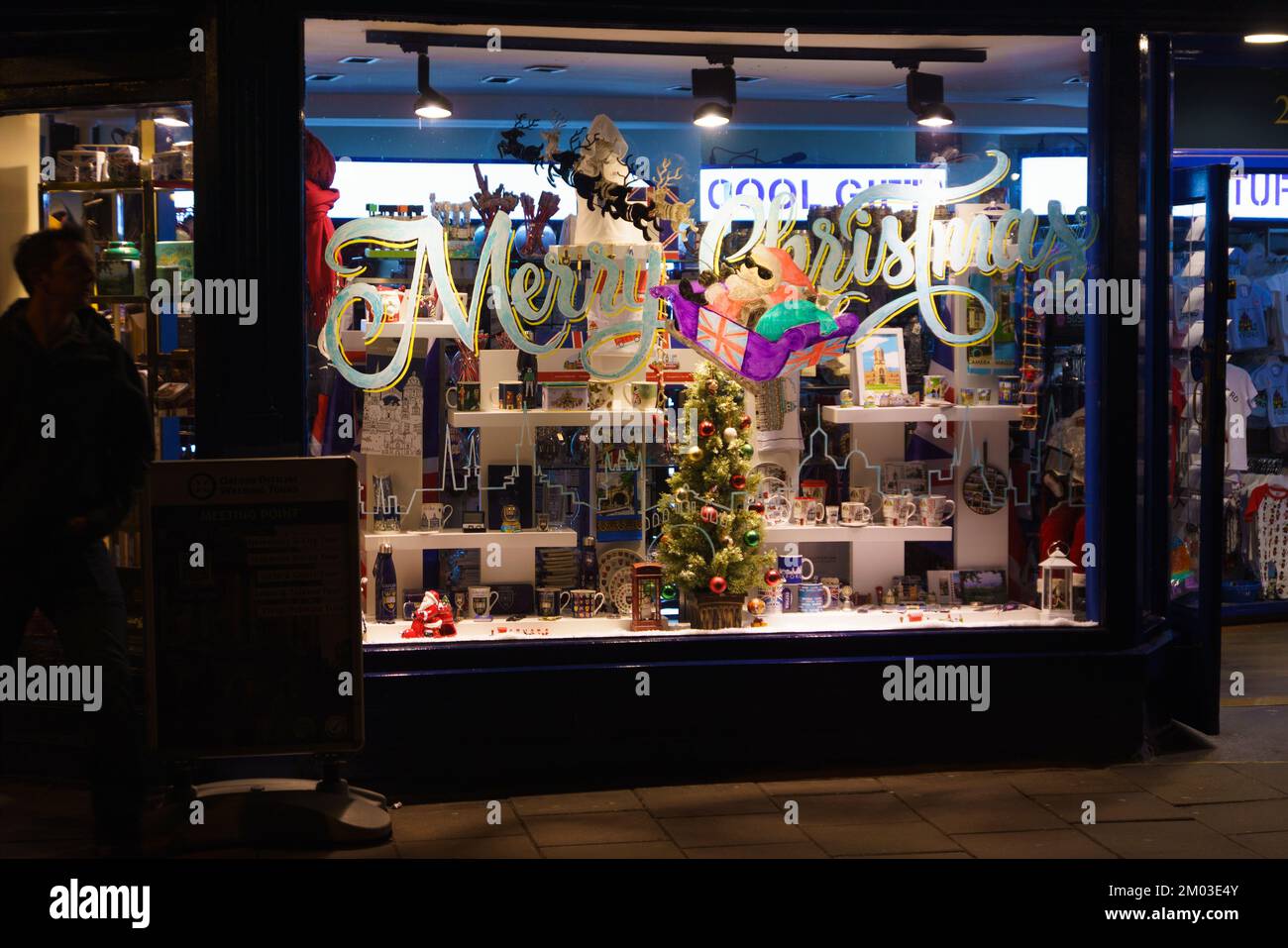 Christmas window displays in Oxford, UK at night. Stores stay open ...