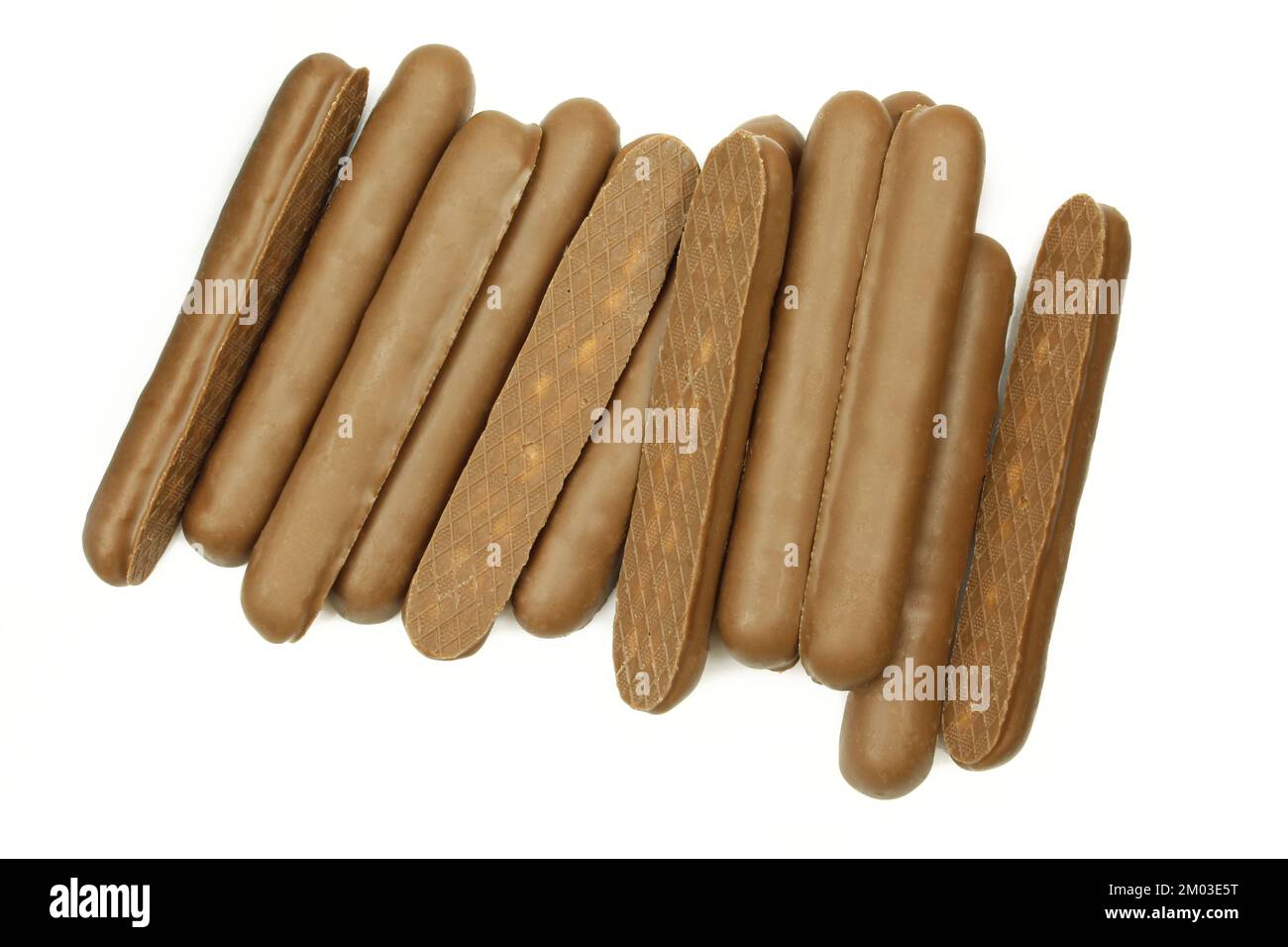 Pile of chocolate coated wafer sticks isolated on white background ...
