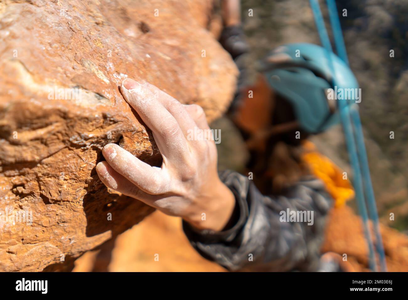 Girl is climbing on the rocks, closeup view on hand Stock Photo - Alamy
