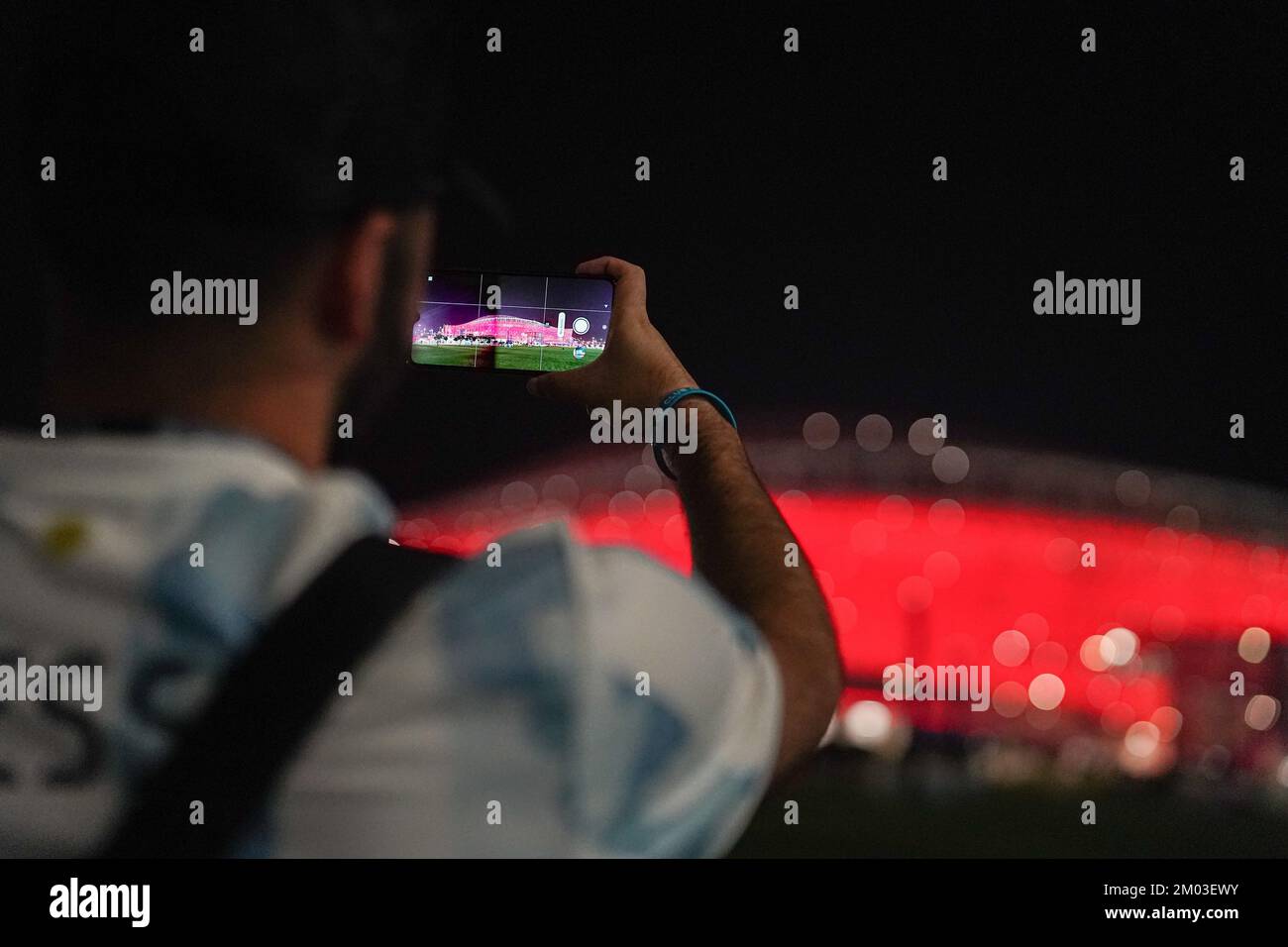 AL RAYYAN, QATAR - DECEMBER 3: Supporter of Argentina takes a photo of ...