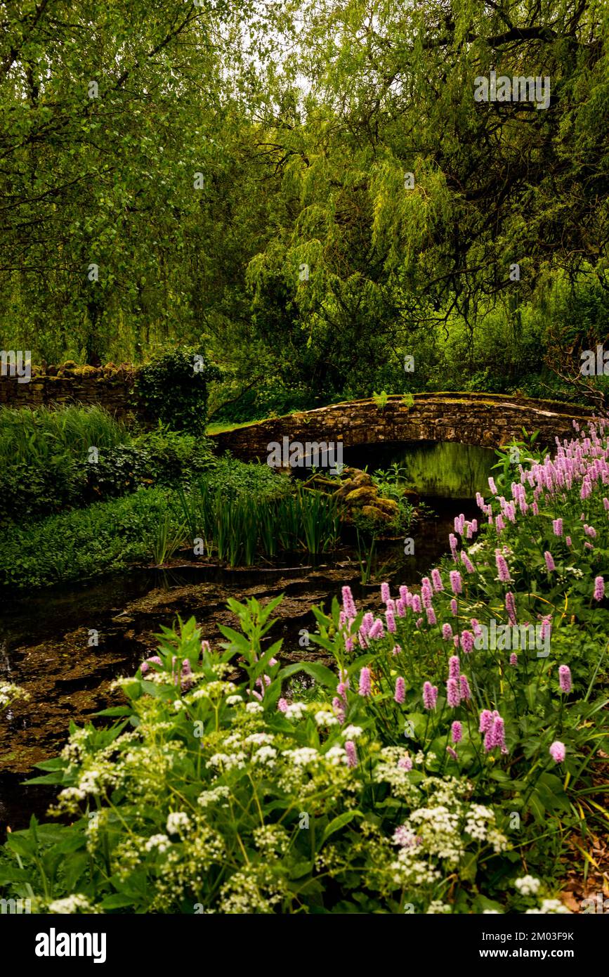 Garden along the Cotswolds Way public paths in the Cotswold District of ...