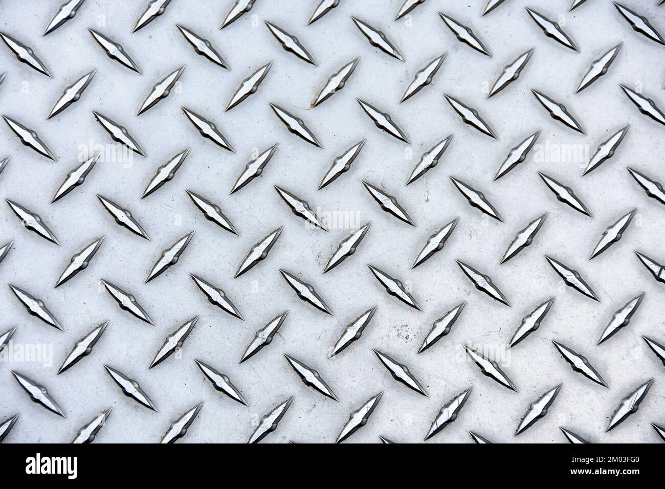 Close-up of shiny steel with texture diamond plate pattern Stock Photo ...