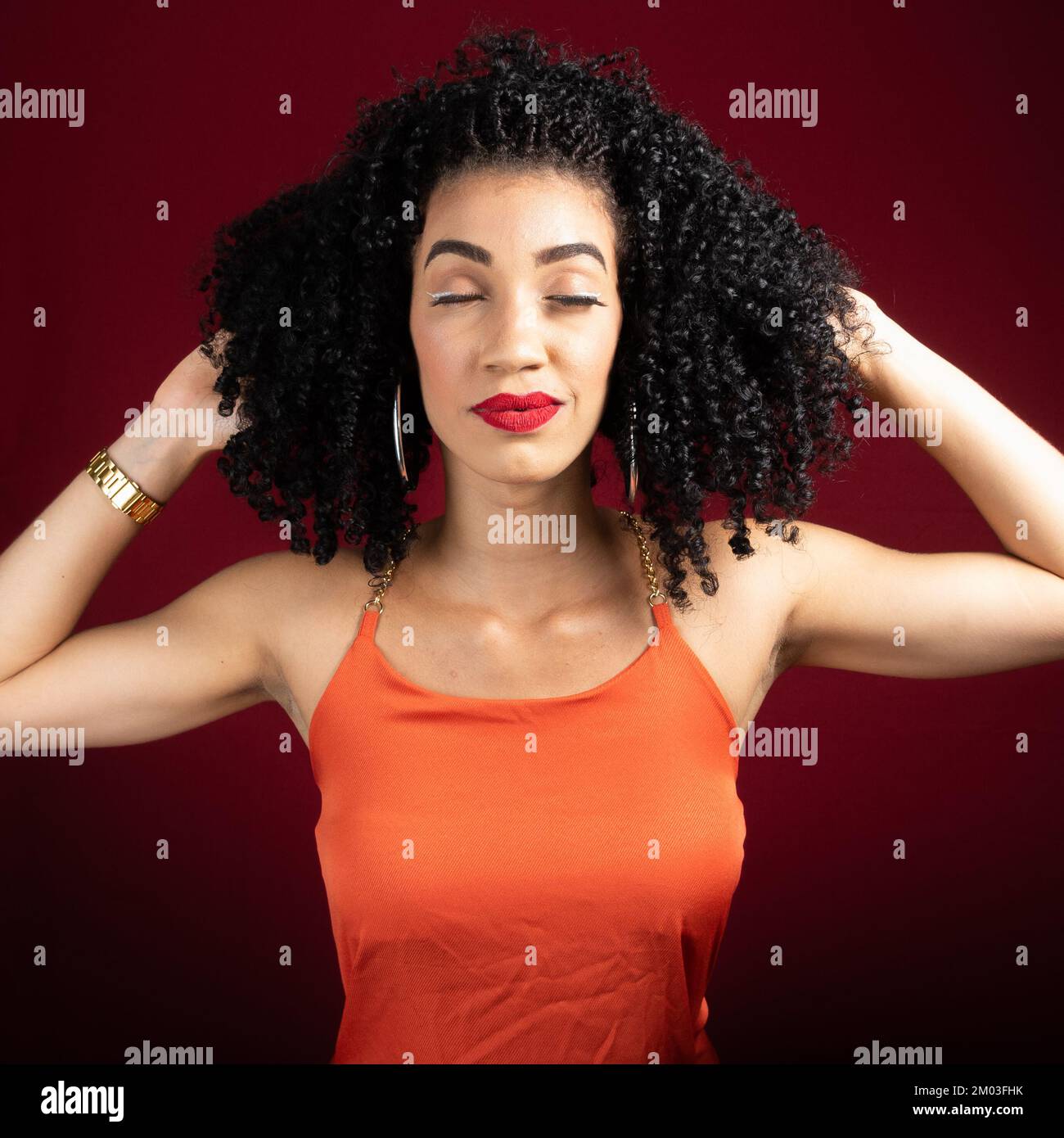 Portrait of young beautiful woman, concentrated, with closed eyes ...