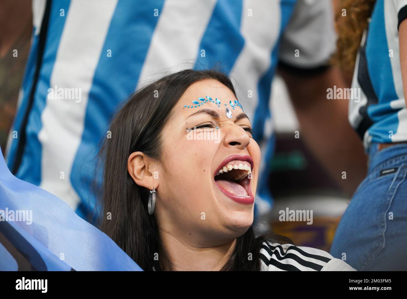 AL RAYYAN, QATAR - DECEMBER 3: Supporter of Argentina poses for a photo ...