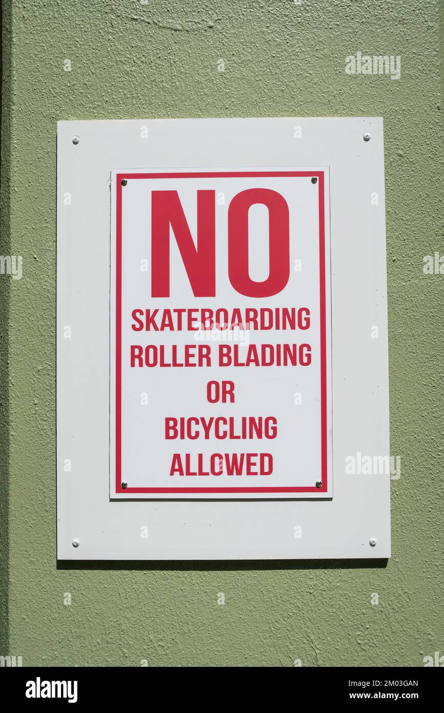 Destin, Florida- Close-up of a signage with No Skateboarding ... Destin, Florida- Close-up of a signage with No Skateboarding ...