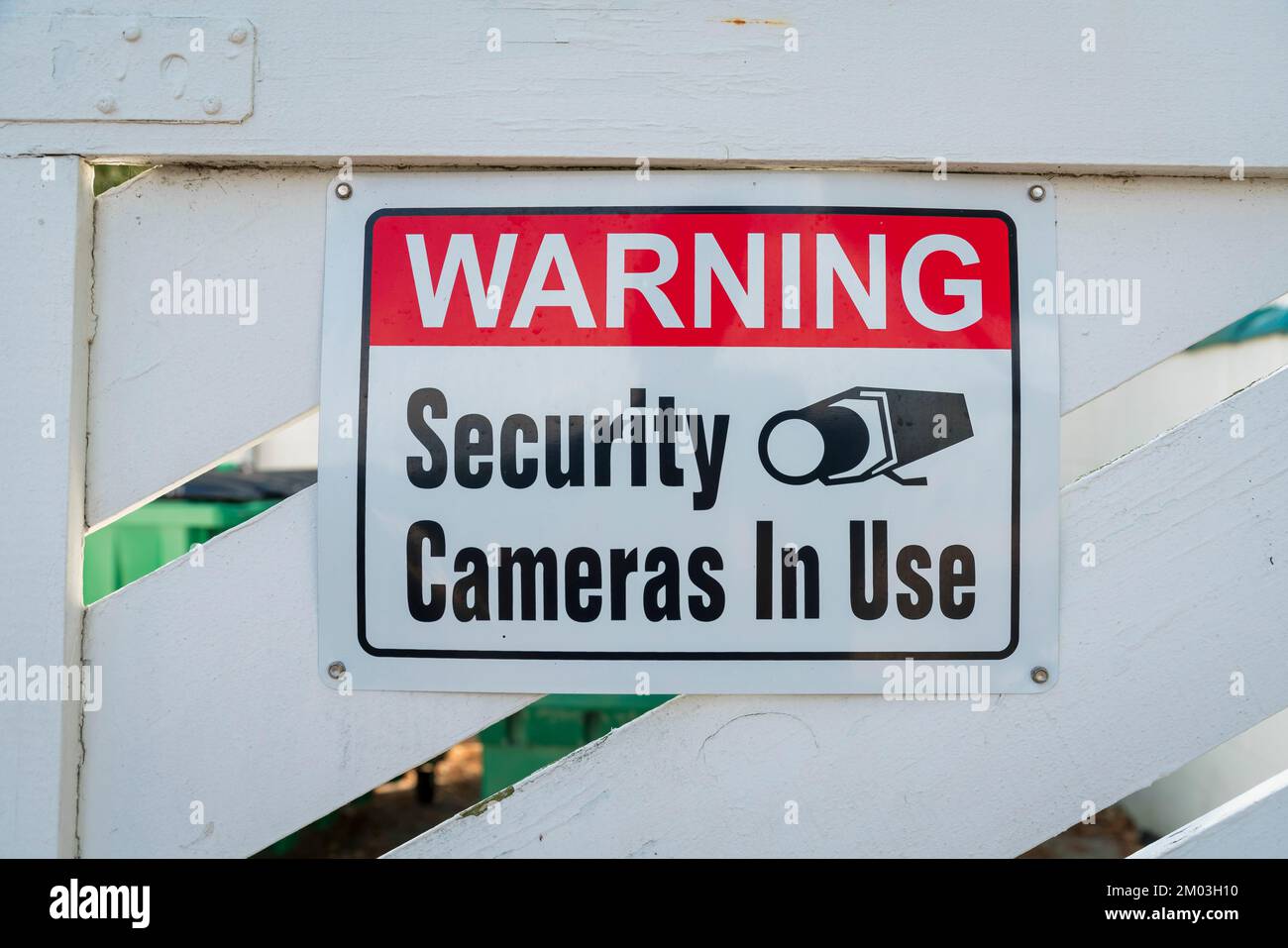 Destin, Florida- Sign with Warning Security Cameras In Use on a wooden ...