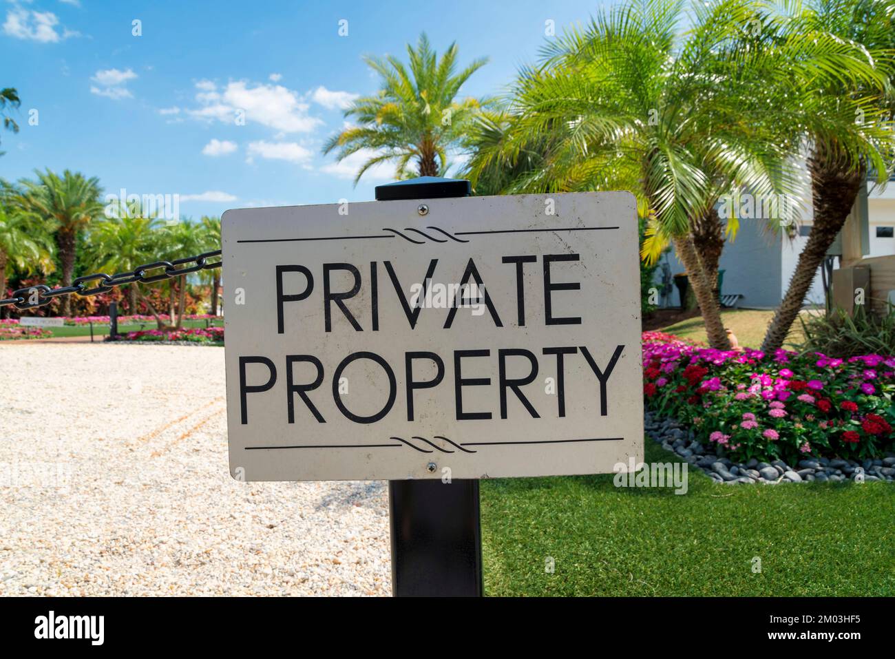 Destin, Florida- Private Property sign on a post outdoors. Close-up of ...