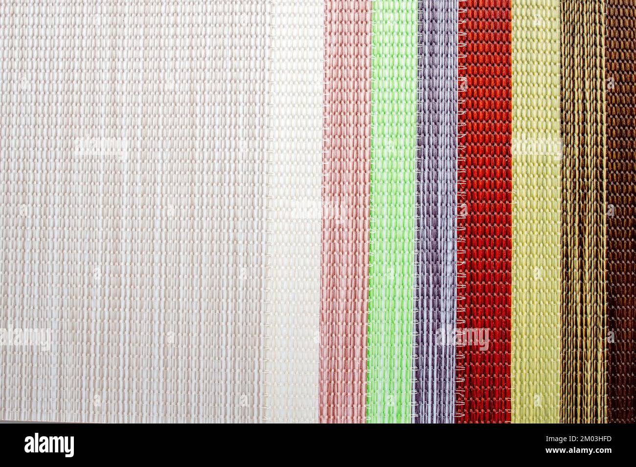 Multicolored fabric background. Variety of color of dense fabric. Color ...