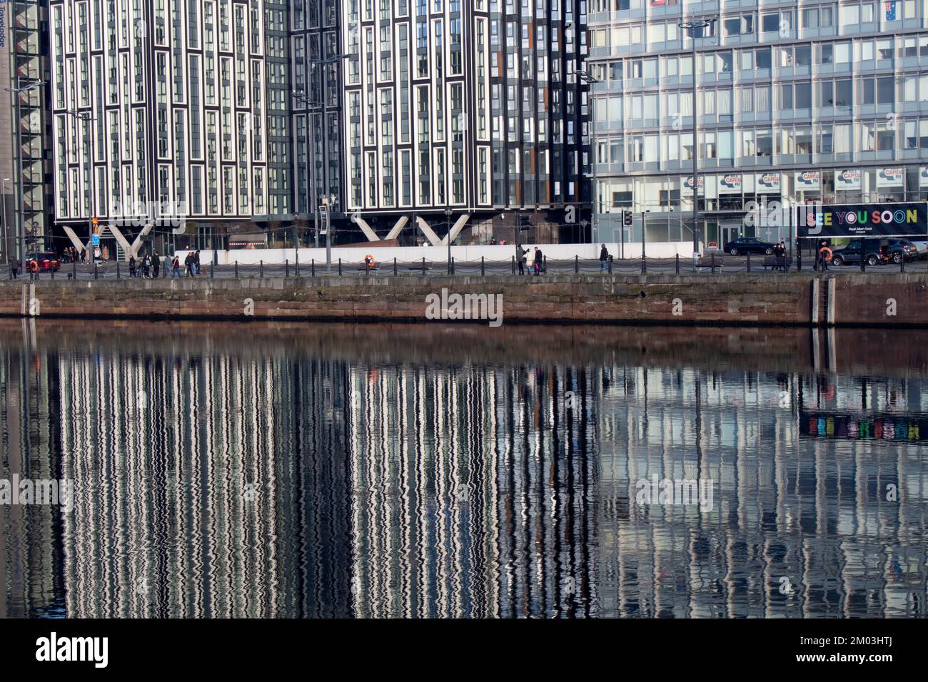 New residential and office blocks reflected in the water, the ...