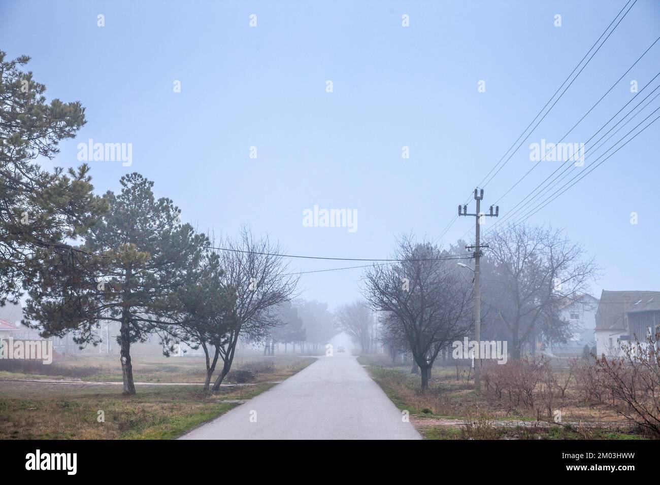 Picture of the streets of a rural village, Bavaniste, blurred by smog ...