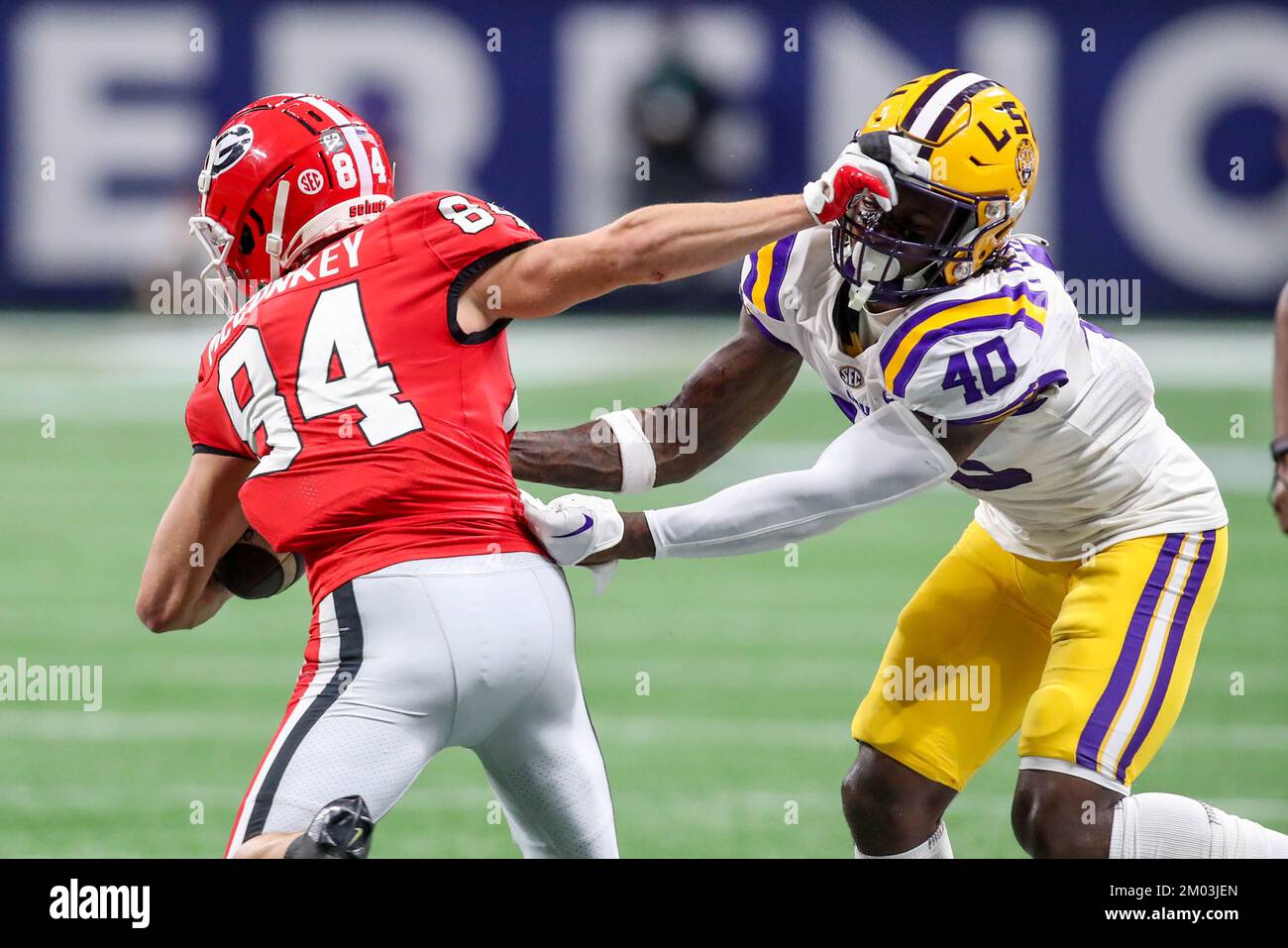 December 03, 2022: Georgia receiver Ladd McConkey (84) tries to get ...