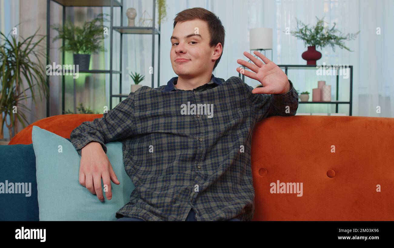 Boy waving goodbye hi-res stock photography and images - Alamy
