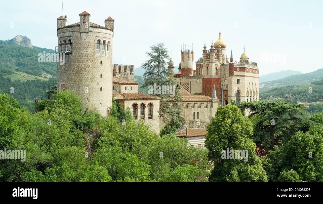 Aerial drone panoramic view of the Rocchetta Mattei castle in Italy on ...