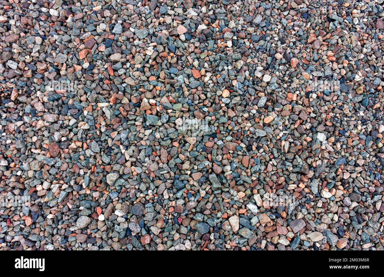 Crushed close up different stone texture background Stock Photo - Alamy