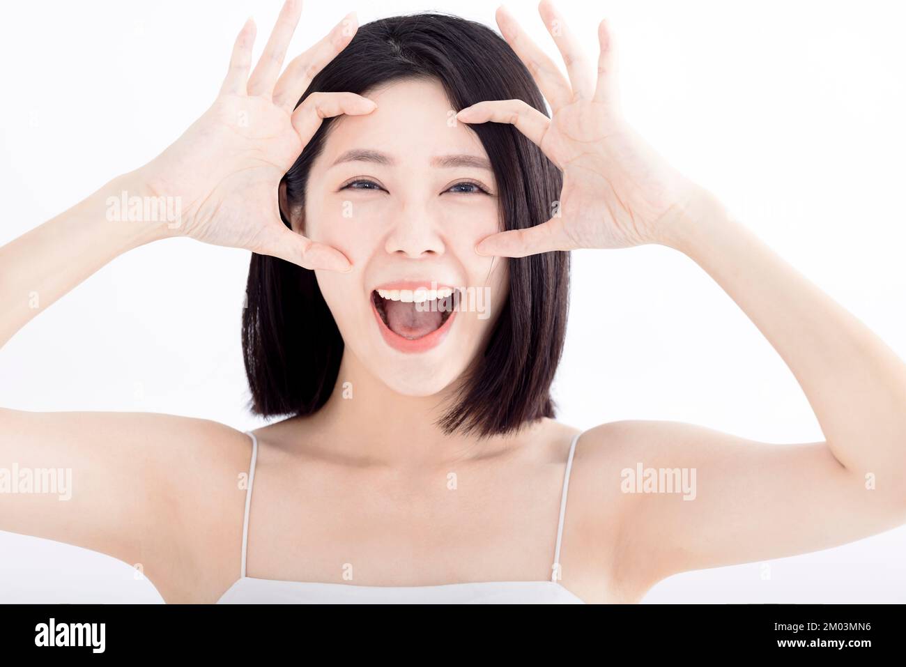 Excited Young woman with Closeup and eye looking gesture Stock Photo ...