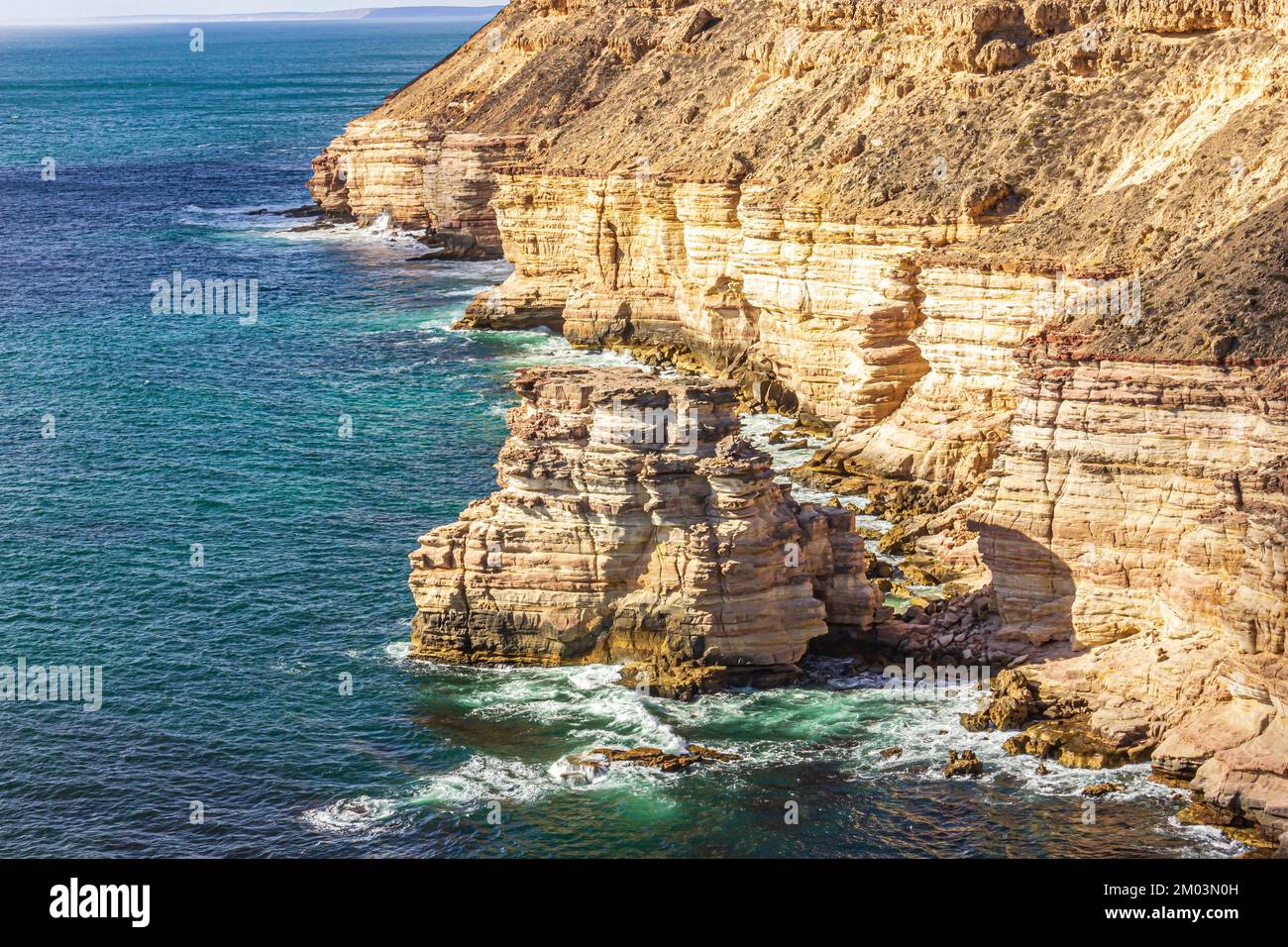 The view of Castle Cove with precarious coastal rock formation called ...